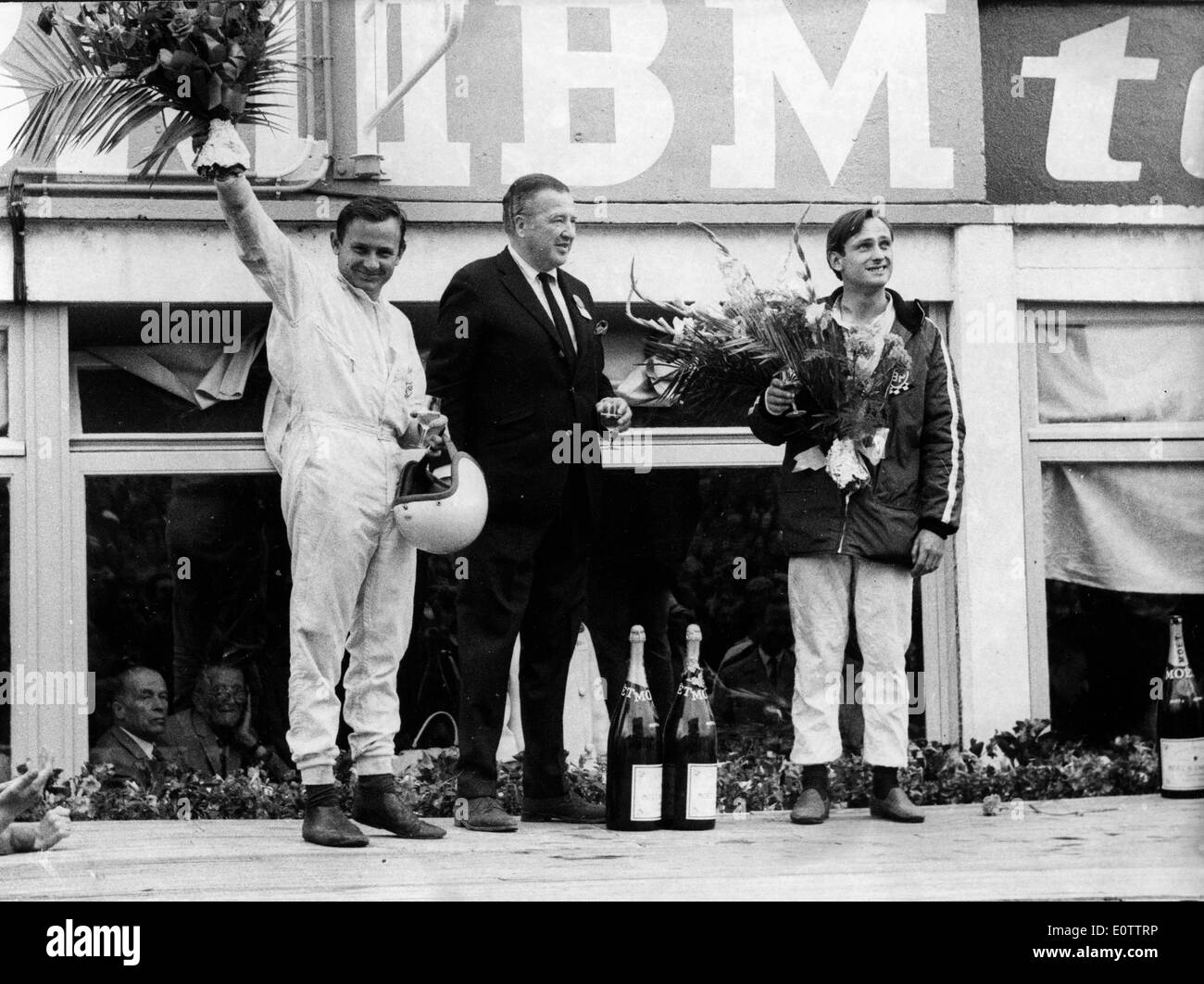 Henry Ford II with the winners of a racing event Stock Photo - Alamy