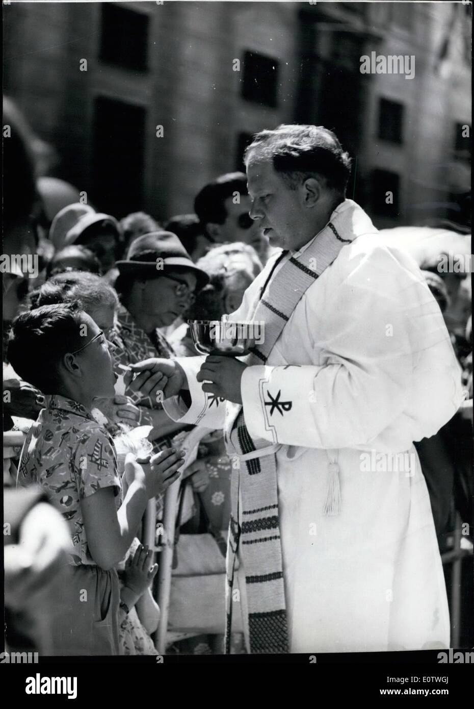 Aug. 08, 1960 - Communion in the open air. Many priests gave the Holy ...