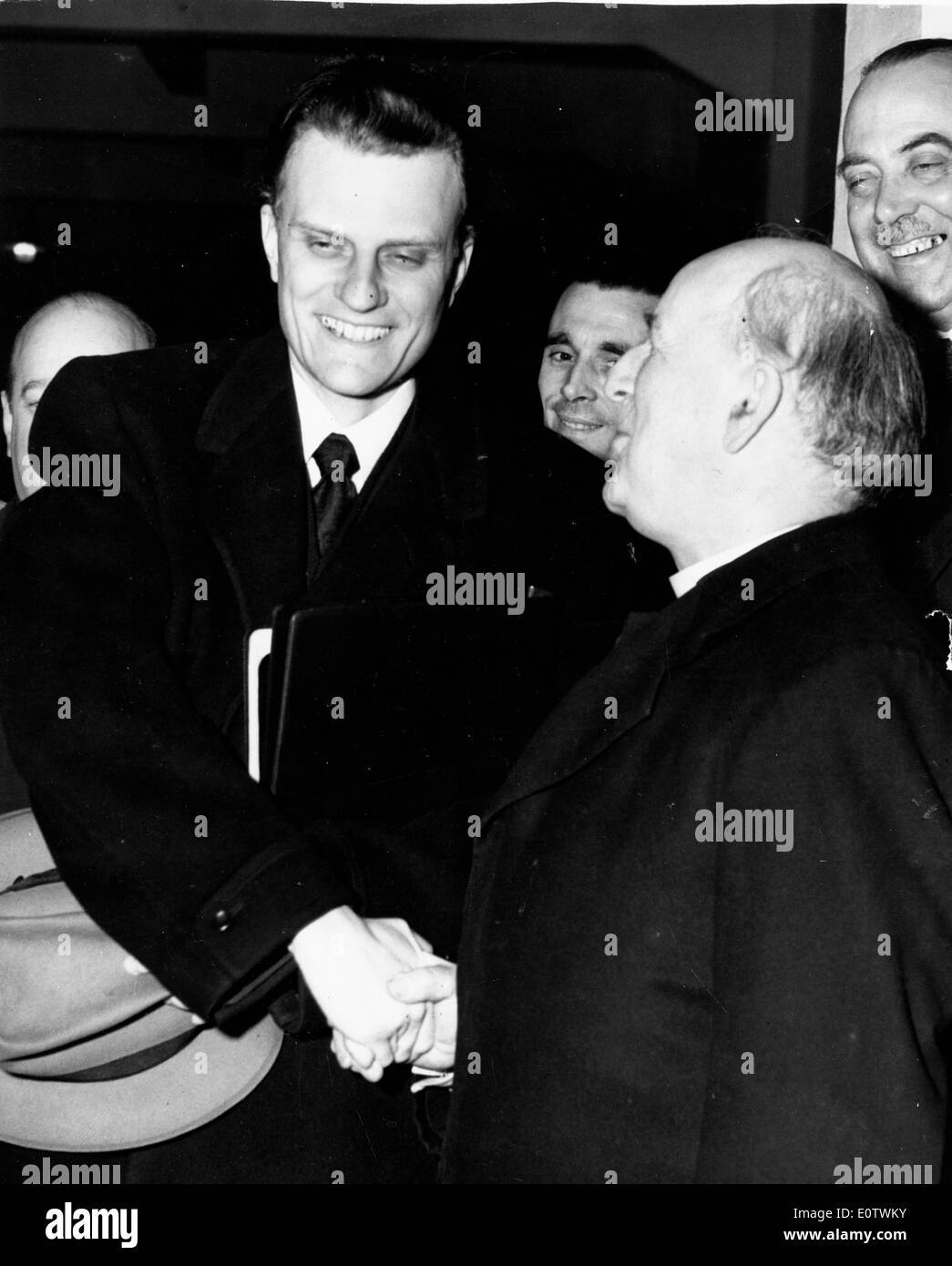 Billy Graham and Archbishop of Canterbury shake hands Stock Photo - Alamy