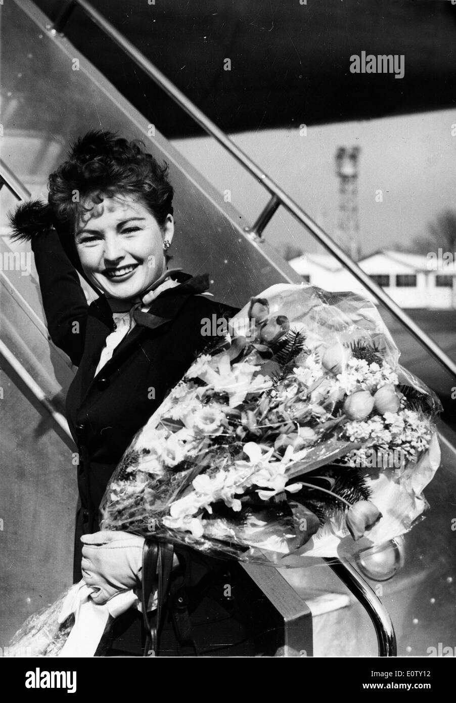 Actress Coleen Gray boarding an airplane in London Stock Photo - Alamy