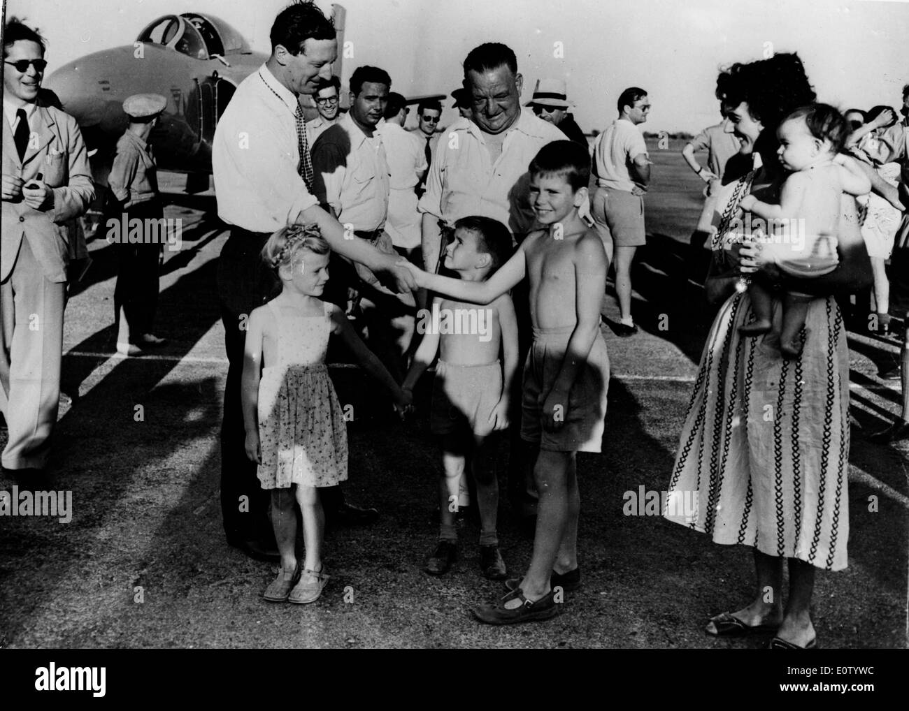 Michael Lithgow shaking hands with children Stock Photo - Alamy