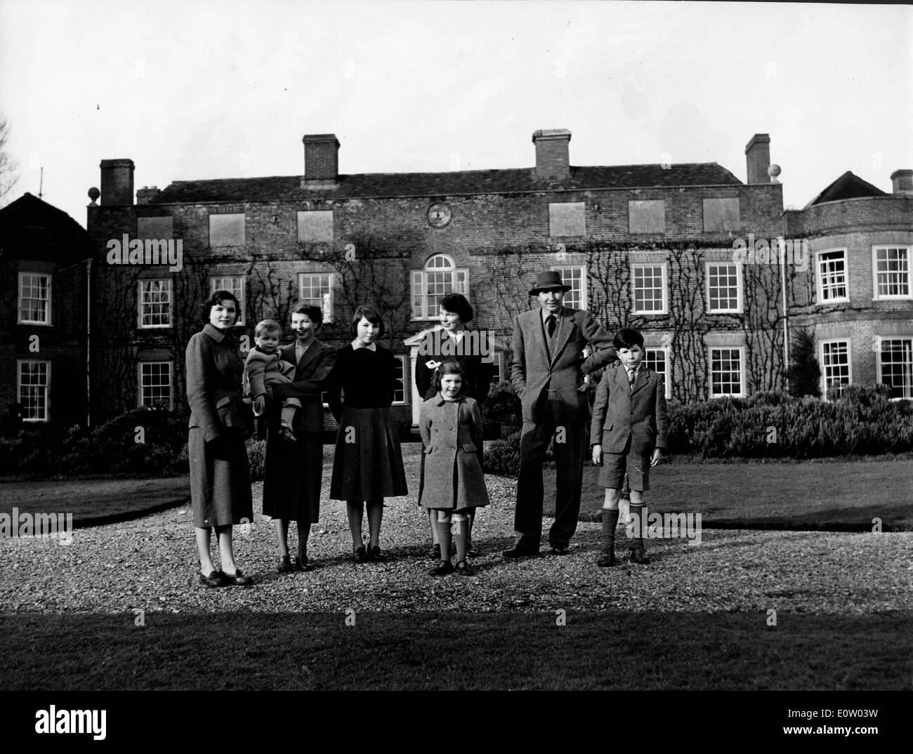 Family outside house Black and White Stock Photos & Images - Alamy
