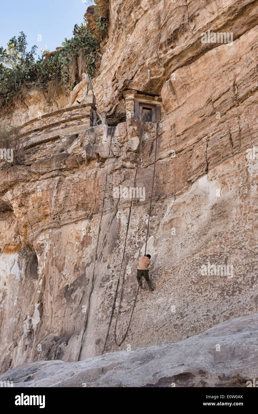 descending the entry rope at Debre Damo Monastery, where only men are ...