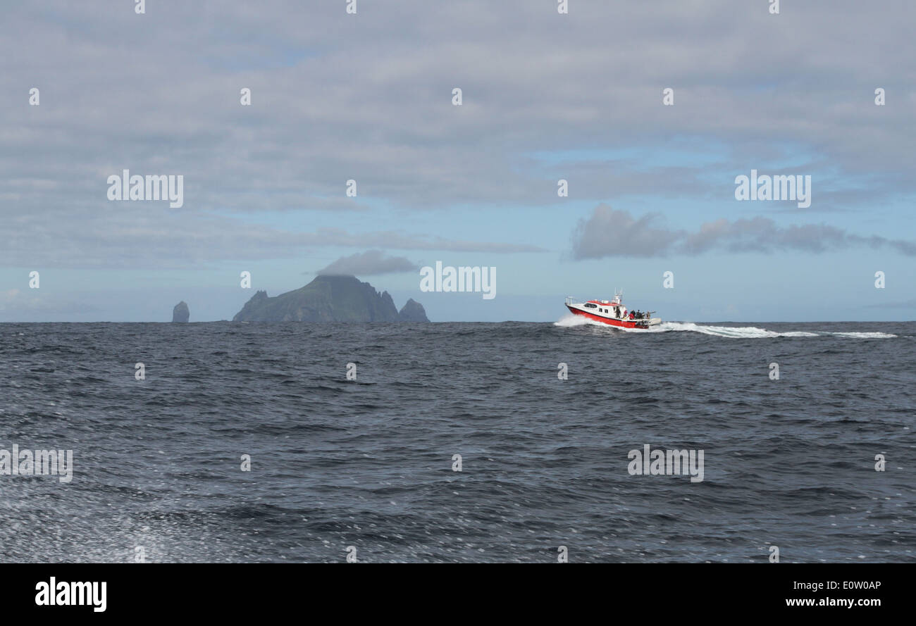 Sea Harris boat and island of Boreray St Kilda Scotland May 2014 Stock ...
