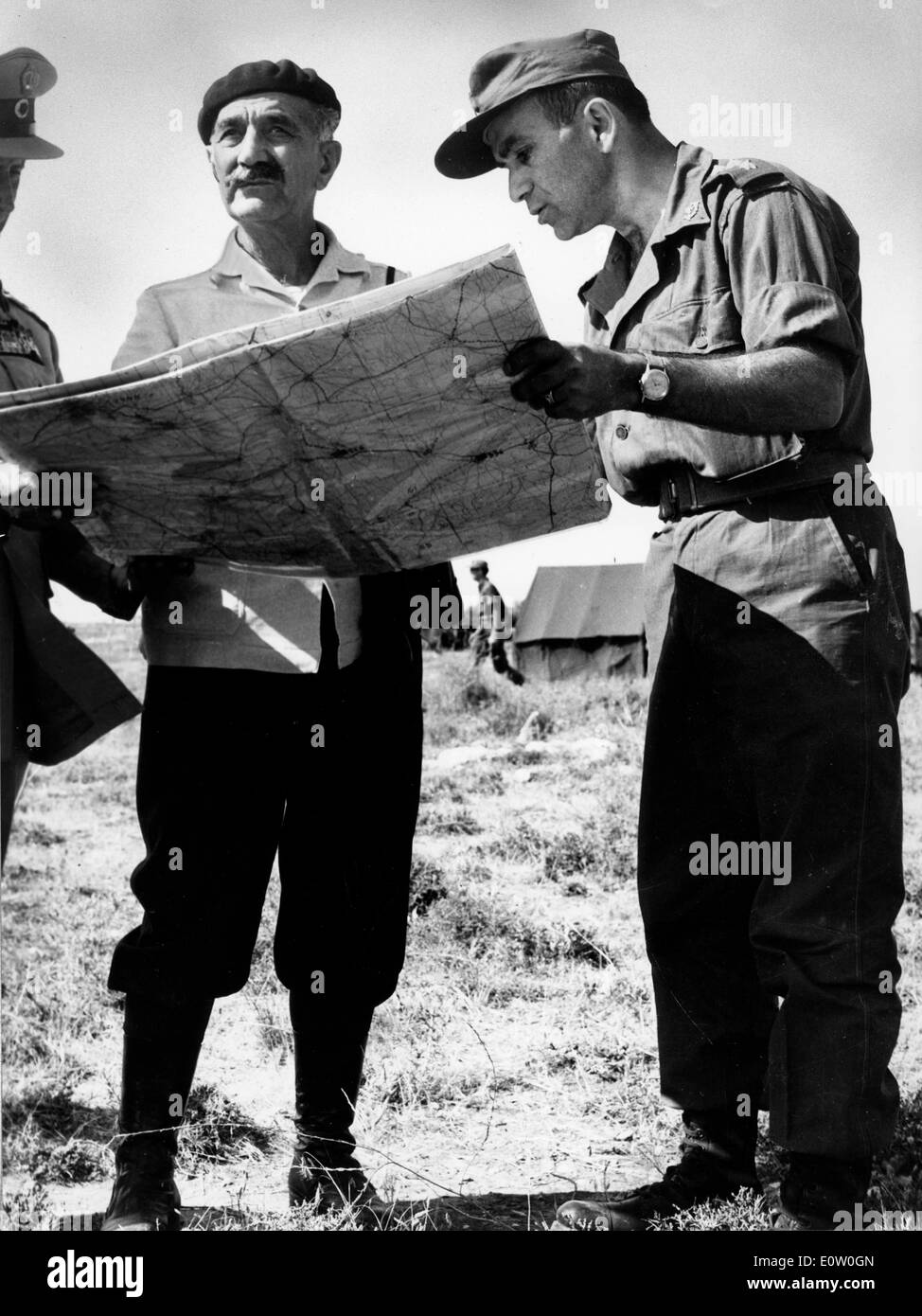 General Georgios Grivas looking over a map with soldiers Stock Photo ...