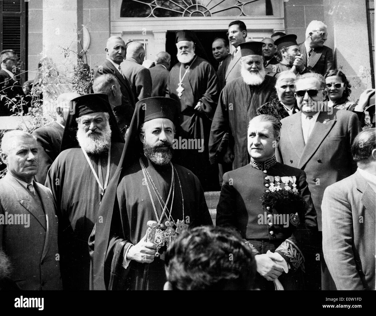 Archbishop Makarios III watches parade with crowd Stock Photo - Alamy