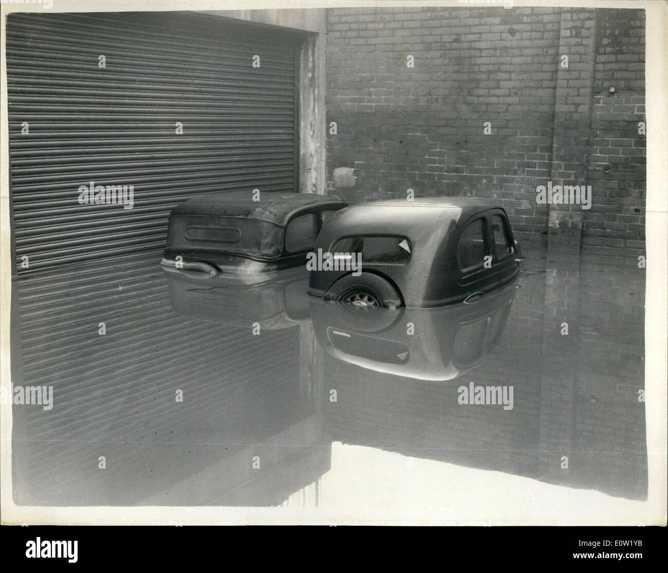 Dec. 12, 1960 - Flood scenes in Wales. Photo shows two half submerged ...
