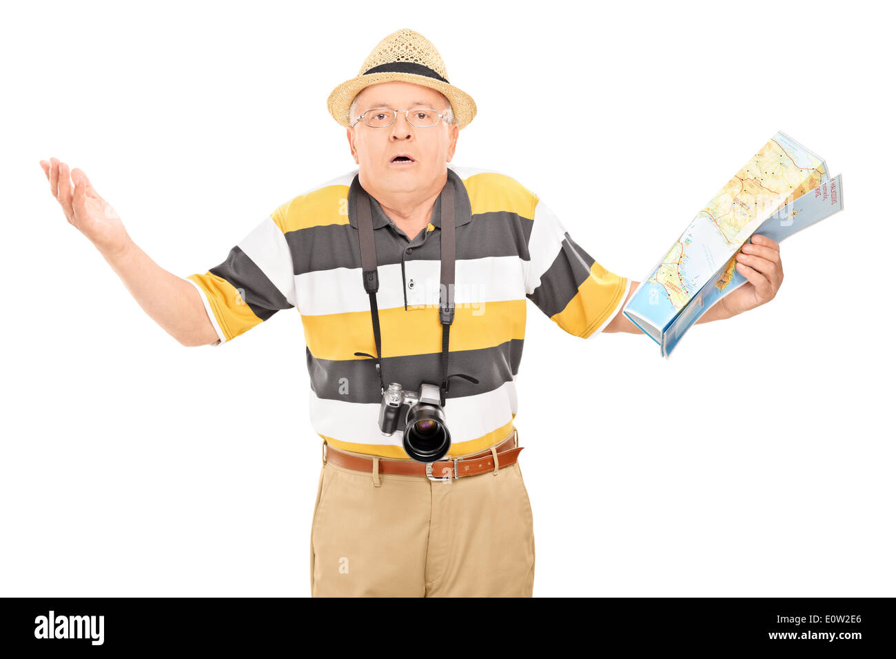 Confused mature tourist holding a map Stock Photo - Alamy