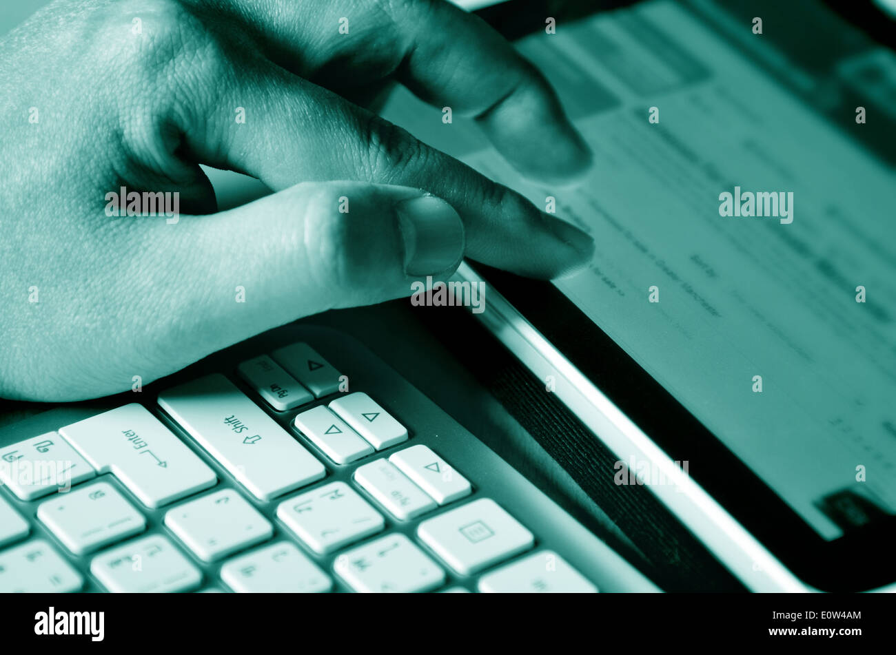 Fingers touching computer hi-res stock photography and images - Alamy