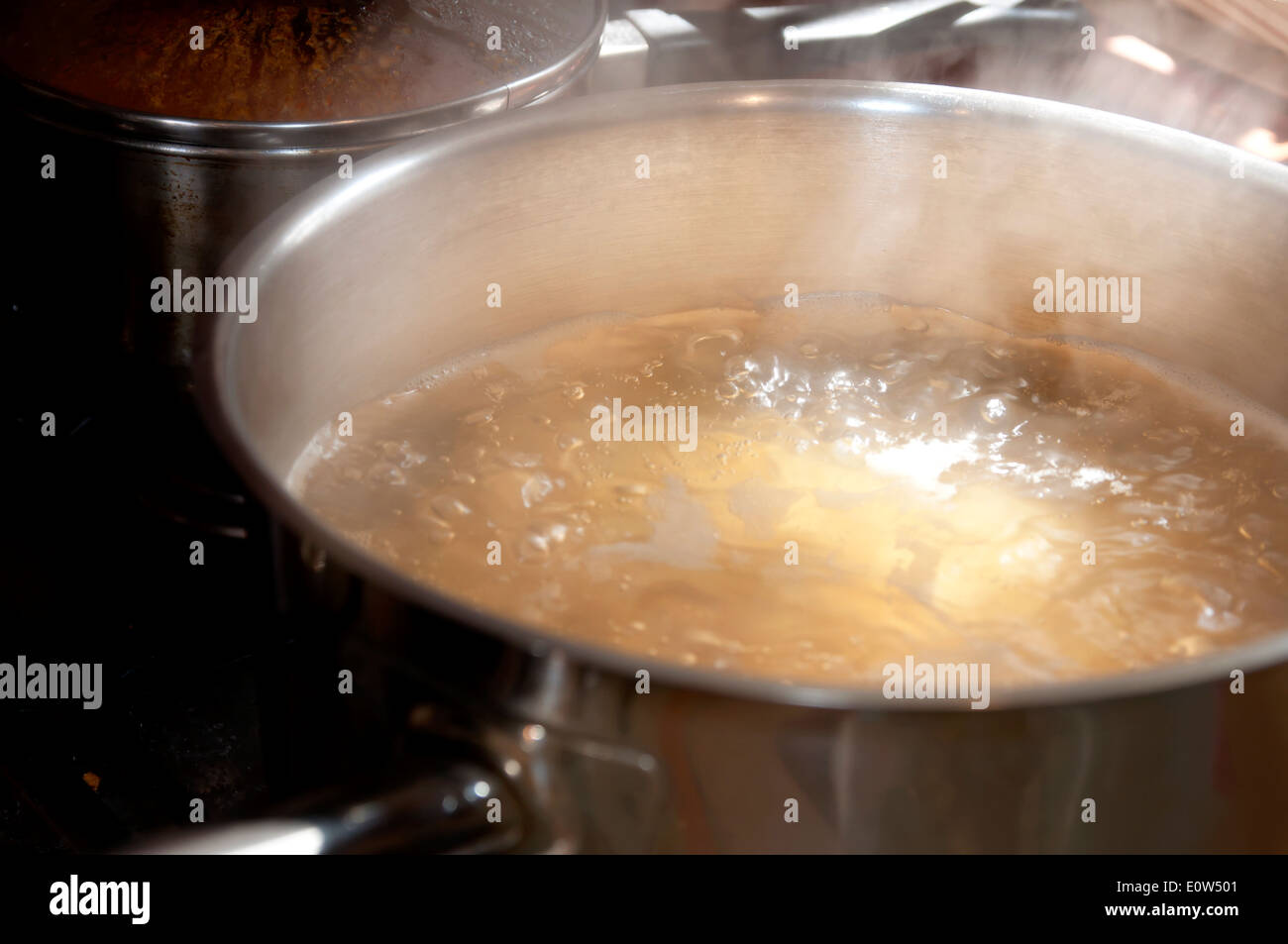 Cooking pasta hi-res stock photography and images - Alamy