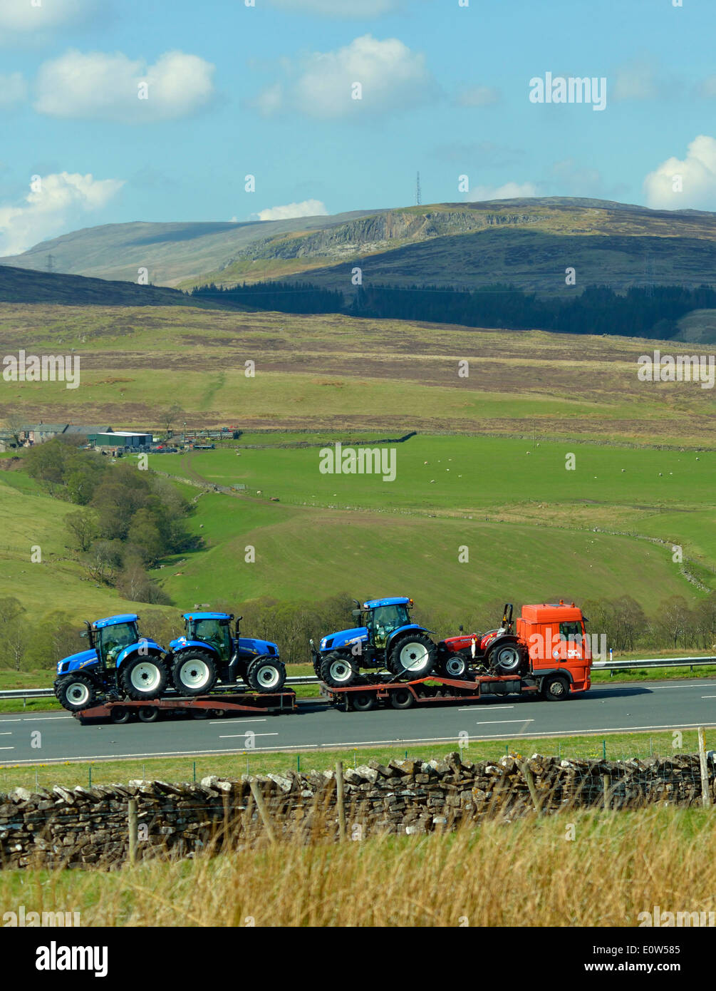 Tractors on lowloader hi-res stock photography and images - Alamy