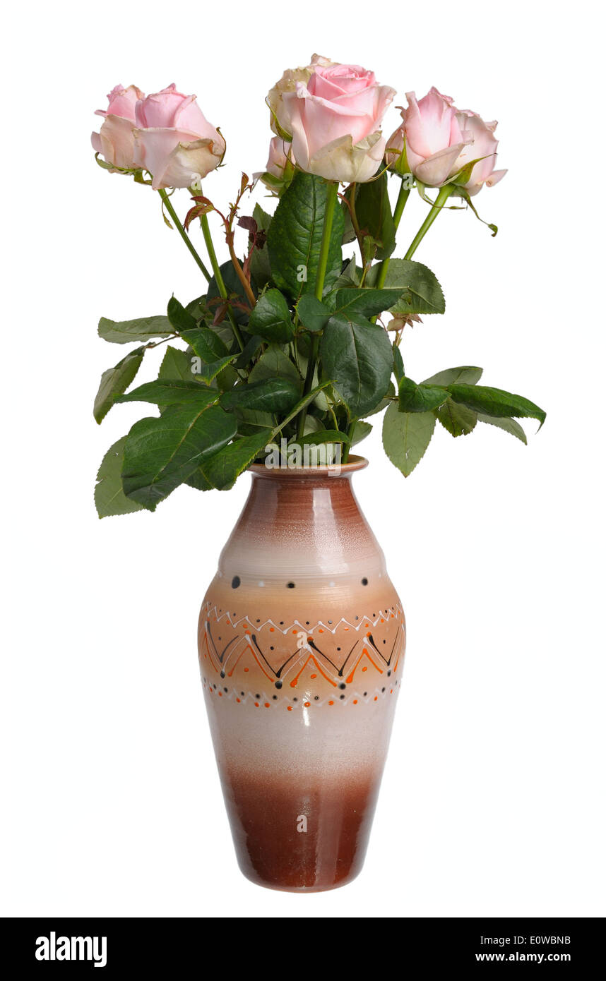 Bouquet of pink roses in a ceramic vase on a white background, isolated ...