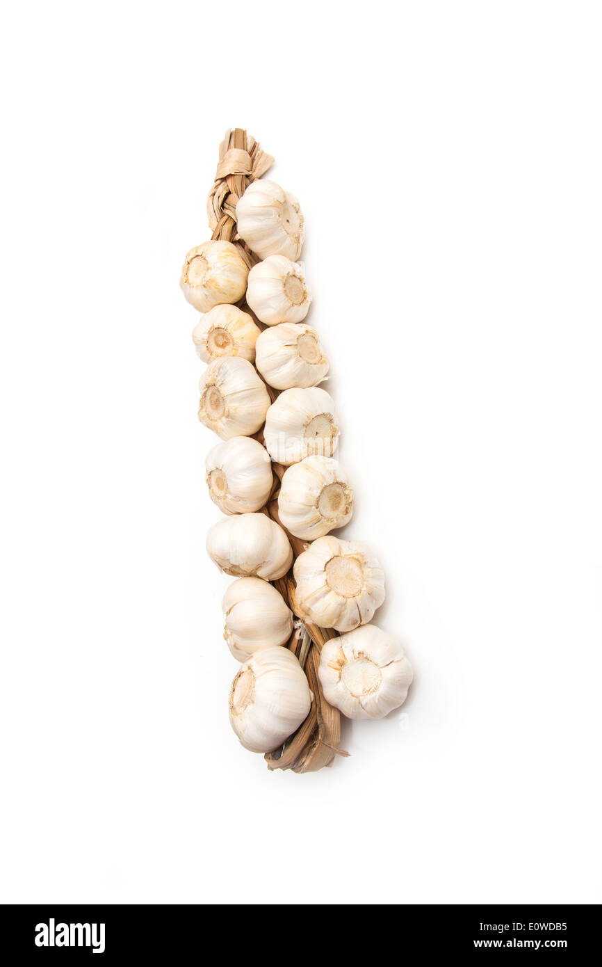 String of Garlic bulbs isolated on a white studio background Stock ...
