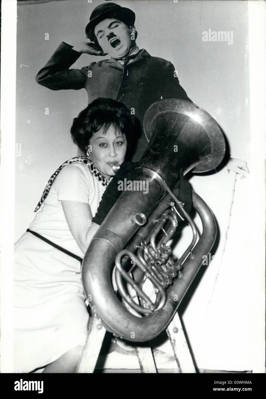 Jan. 01, 1963 - Chaplin yawns and closed his one ear, but not because ...