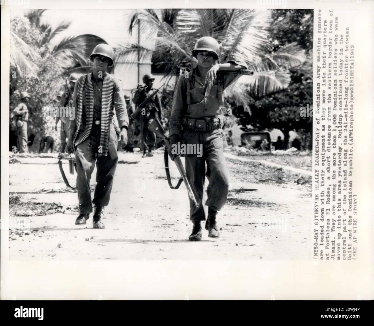 May 06, 1963 - They're really loaded - Pair of Dominion Army machine ...