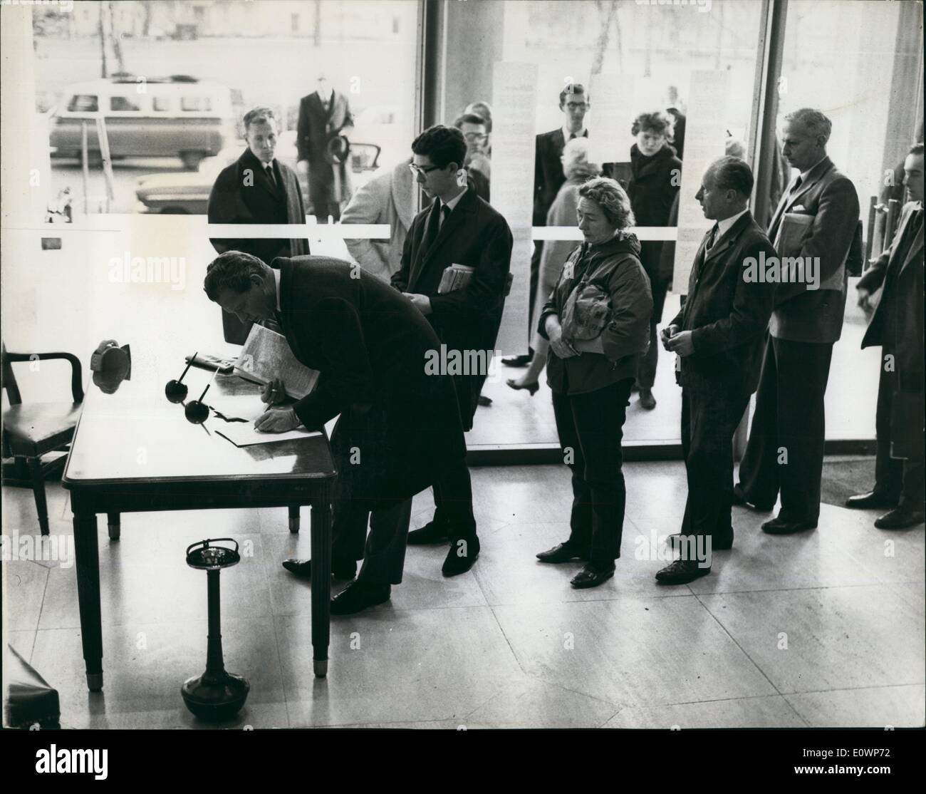 Nov. 11, 1963 - Shocked Americans : At the Embassy in London reading ...