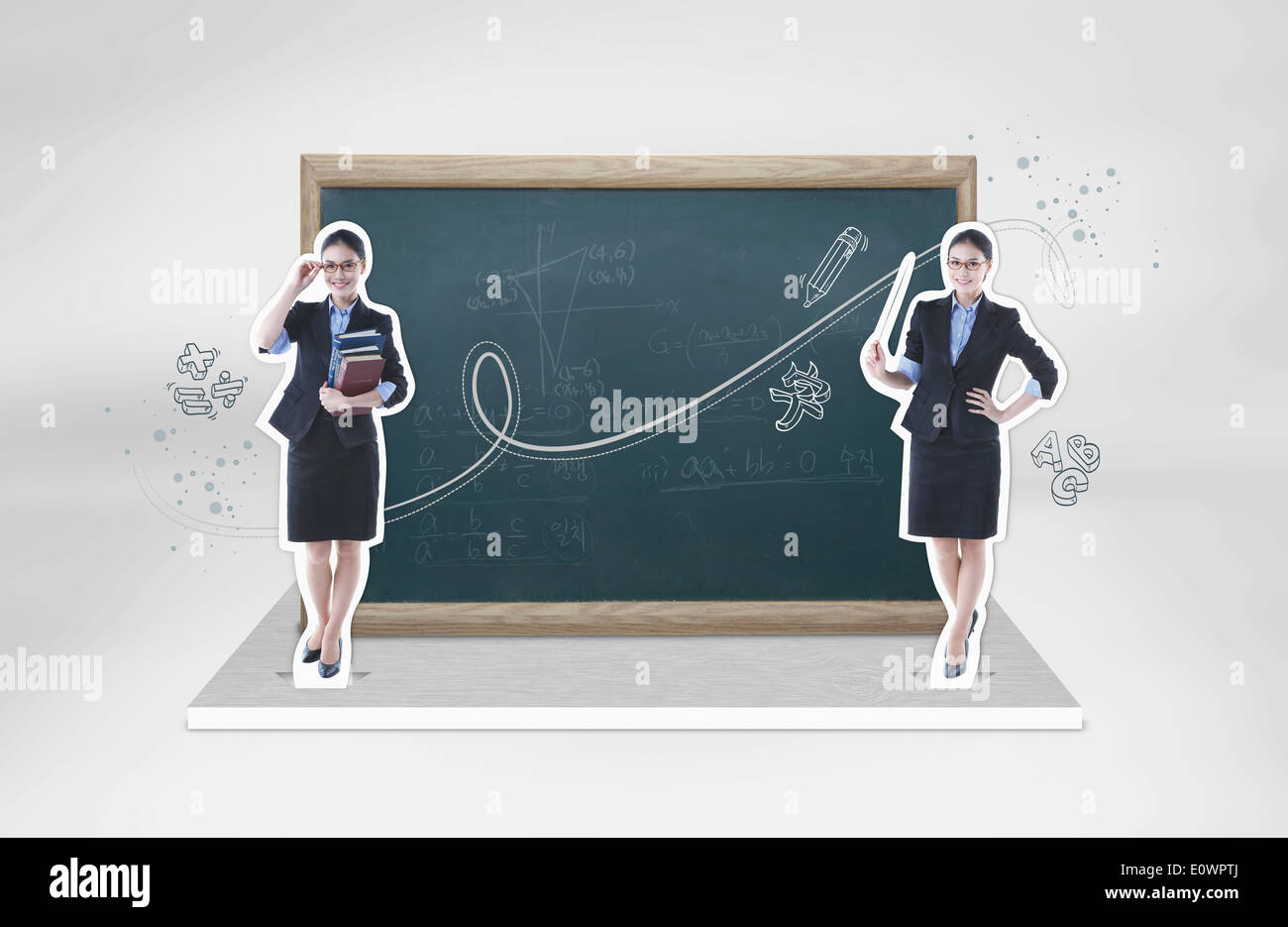 teachers next to a chalk board Stock Photo - Alamy