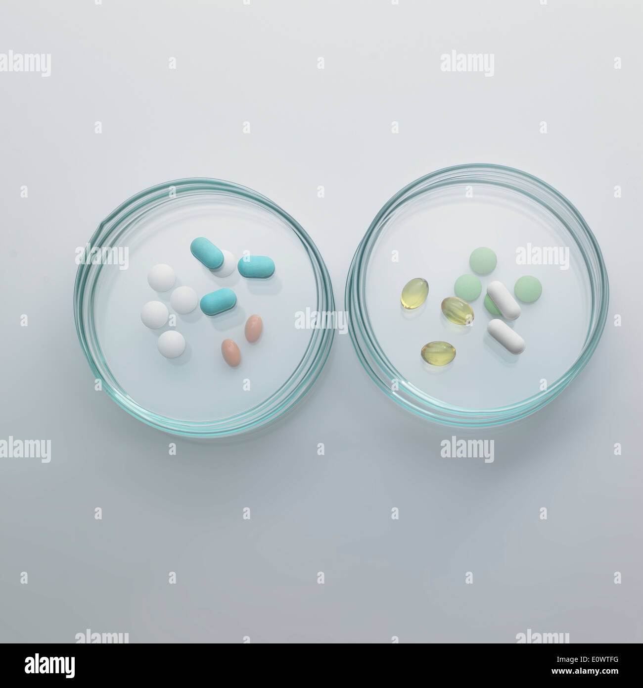two sets of pills and capsules Stock Photo - Alamy