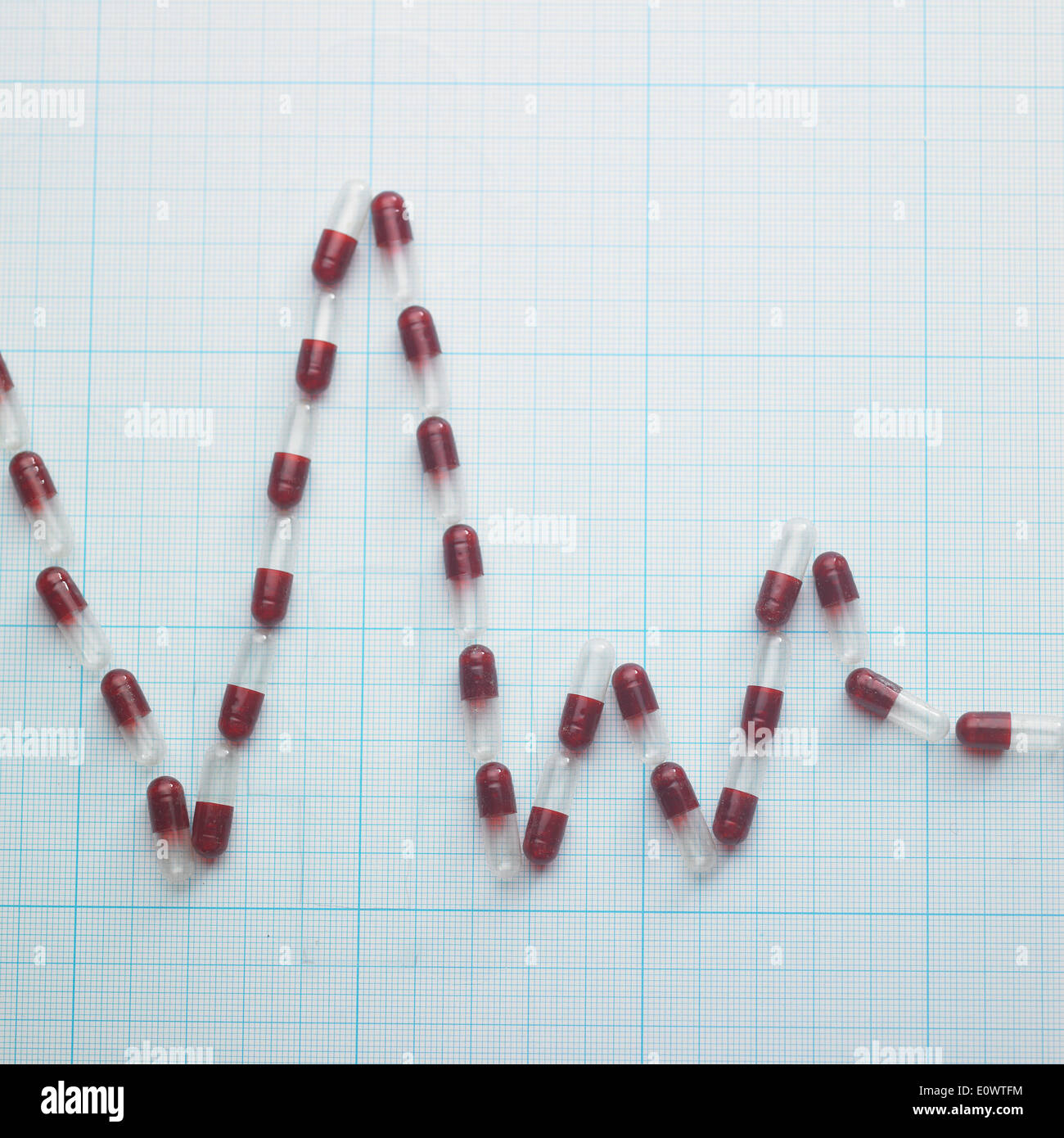capsules making a heart line Stock Photo - Alamy
