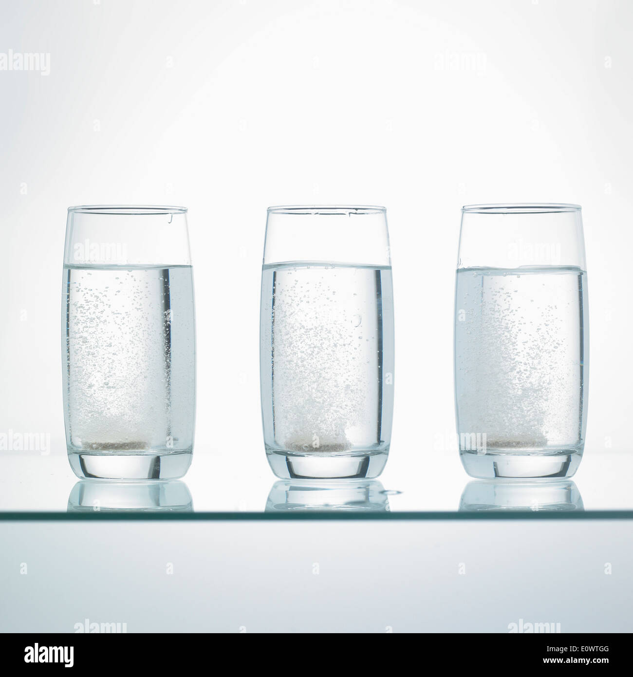 three glasses full of water Stock Photo - Alamy