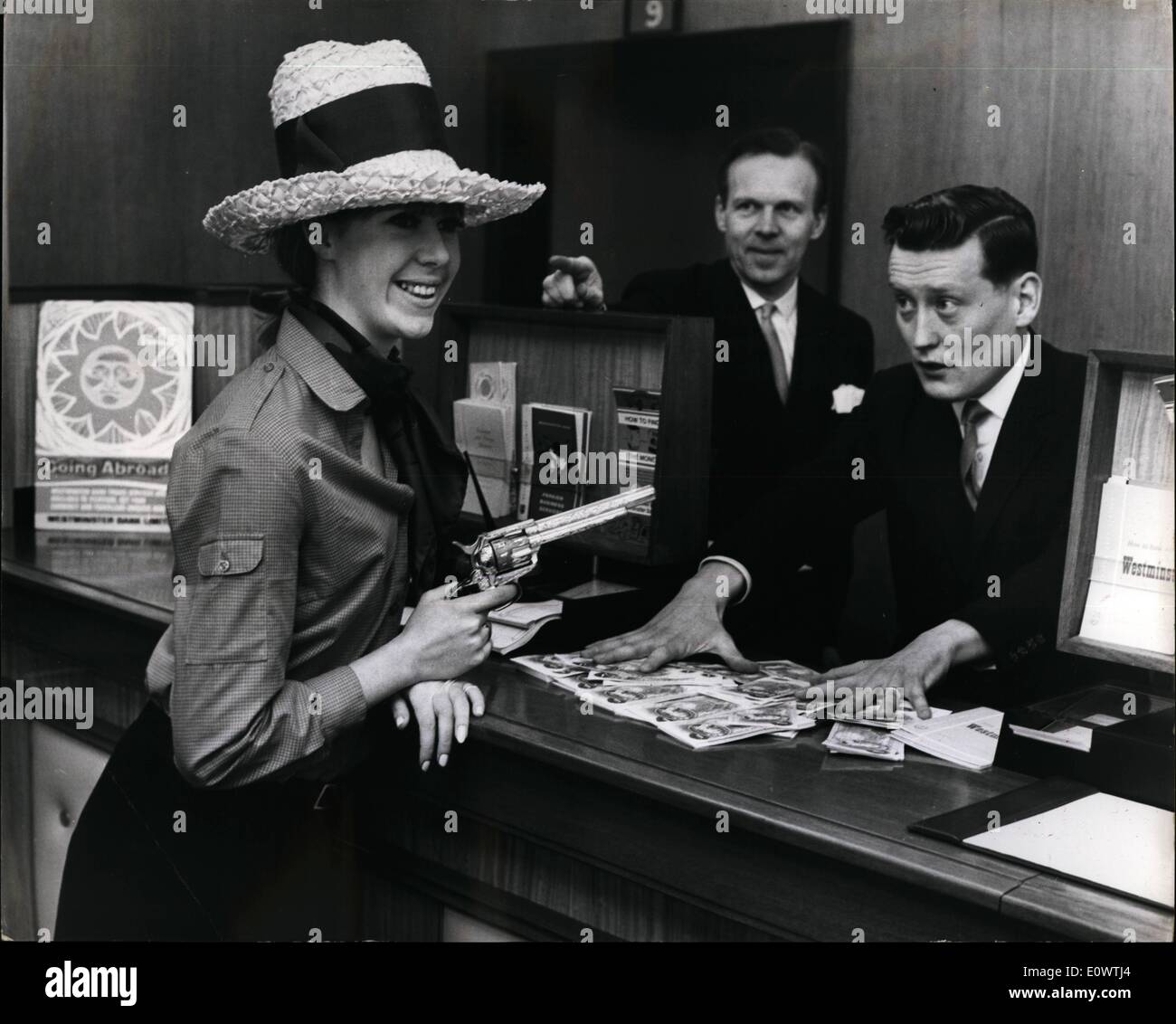 Apr. 04, 1964 - ''Hold Up'' In London Bank :A girl in a ''wild west ...