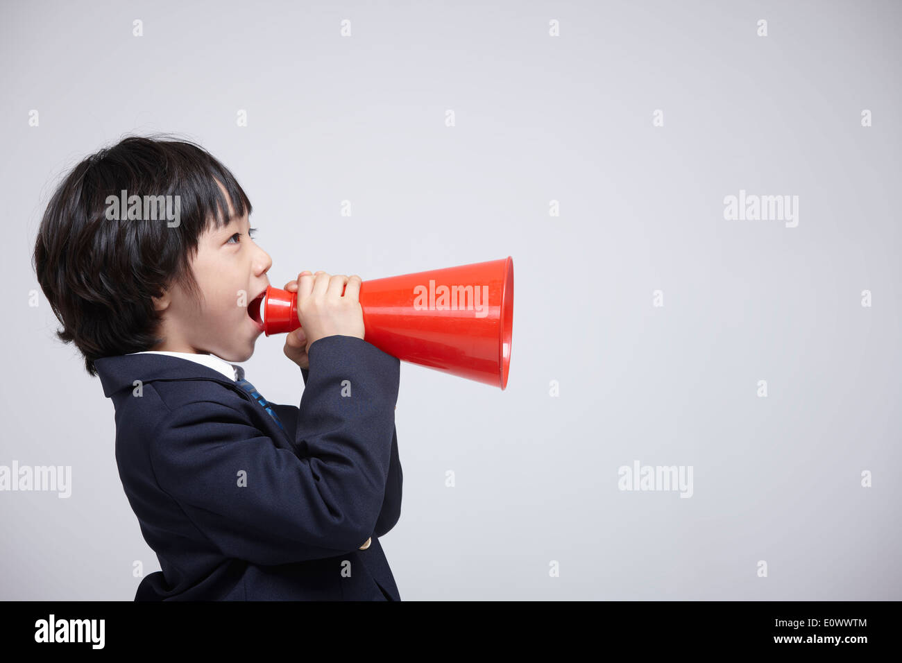 Boy using megaphone side view hi-res stock photography and images - Alamy