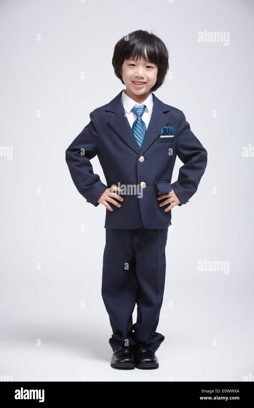 a boy wearing a business suit Stock Photo - Alamy
