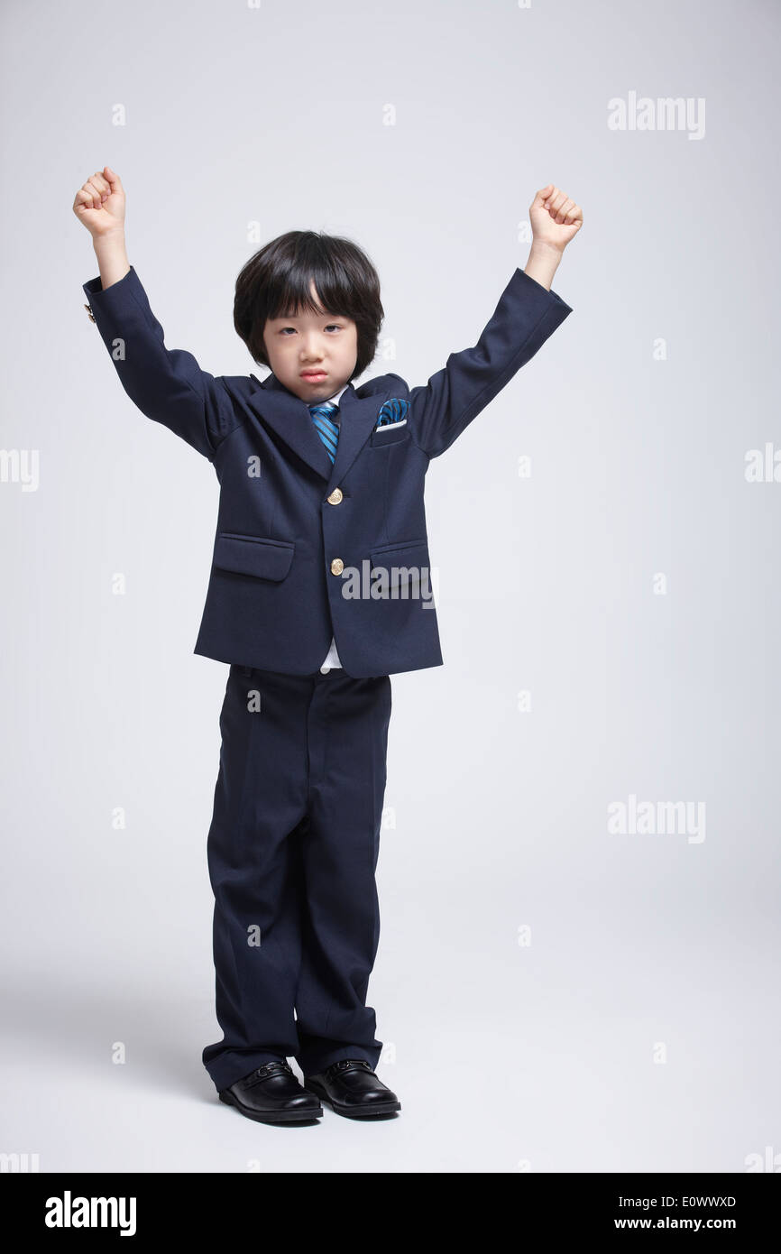a boy wearing a business suit Stock Photo - Alamy