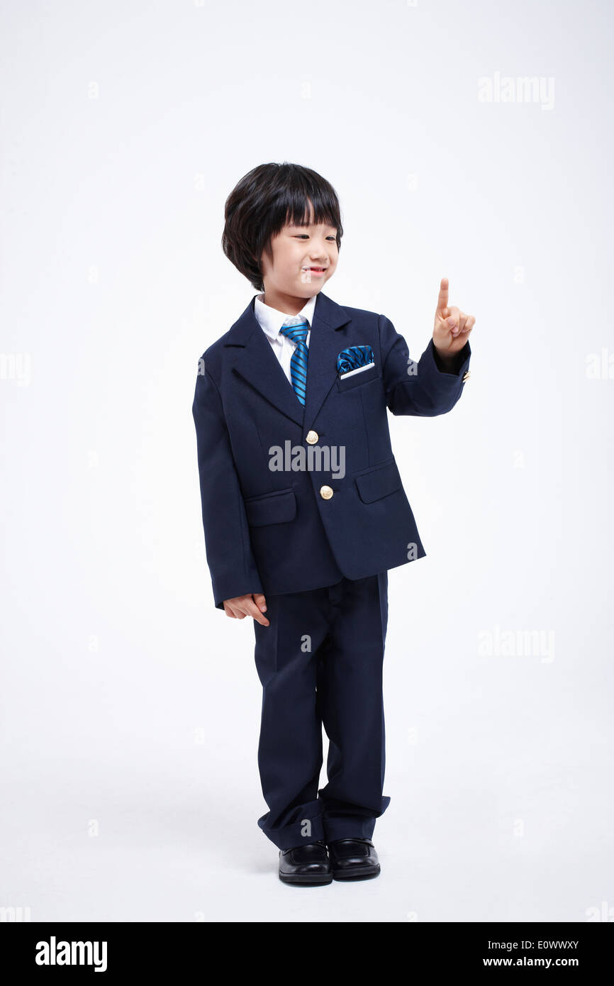 a boy wearing a business suit Stock Photo - Alamy