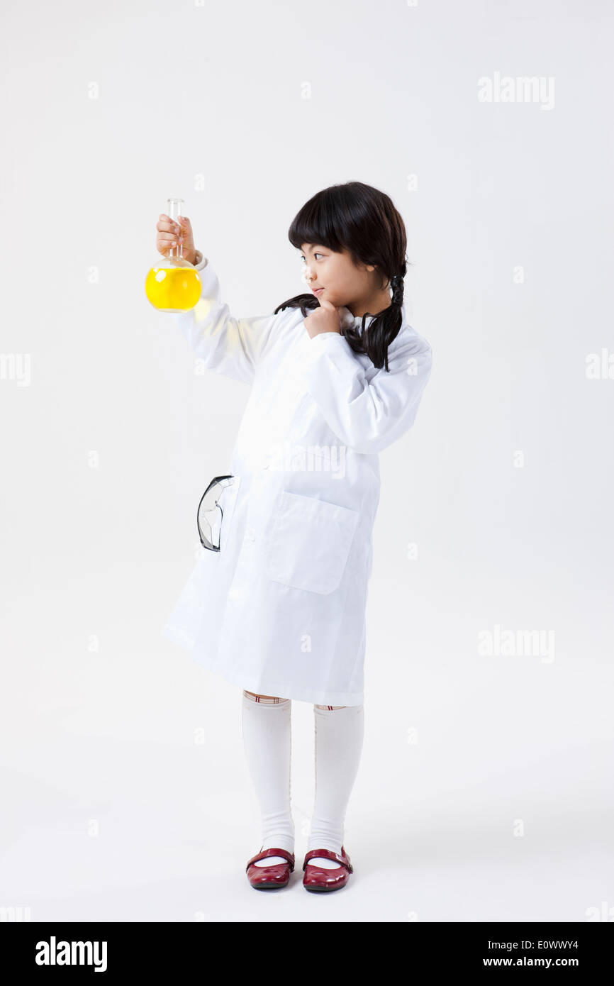 a girl wearing a chemist uniform Stock Photo - Alamy