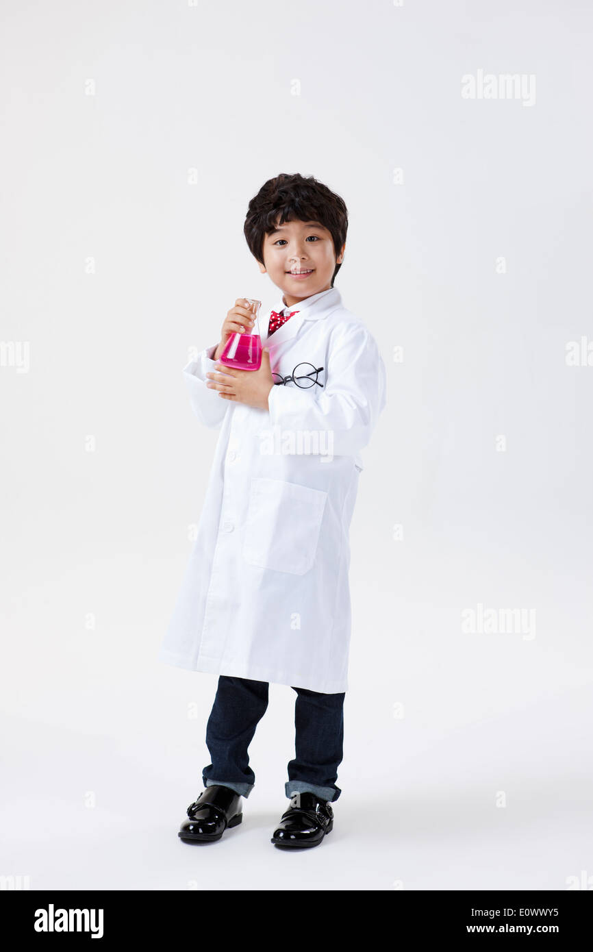 a boy wearing a chemist uniform Stock Photo - Alamy