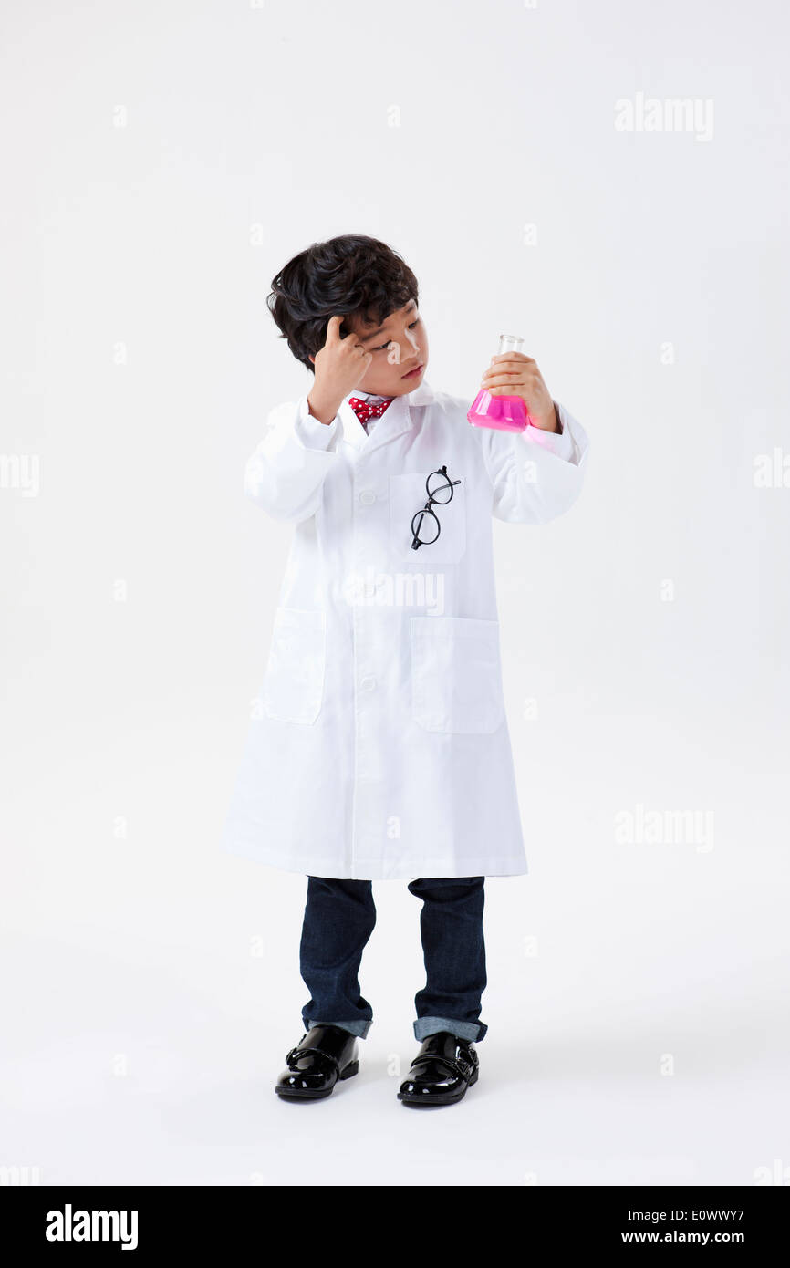 a boy wearing a chemist uniform Stock Photo - Alamy