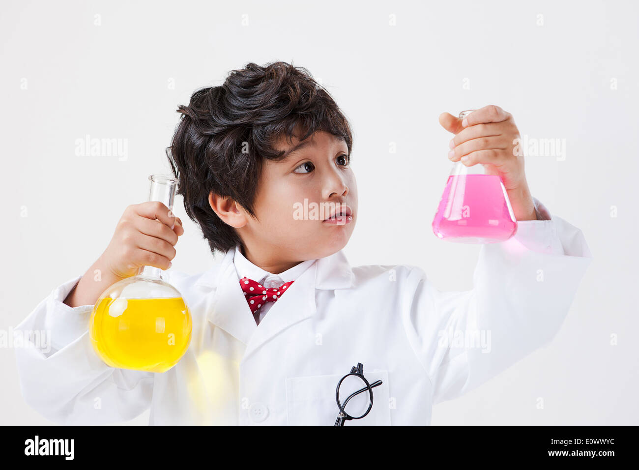 a boy wearing a chemist uniform Stock Photo - Alamy