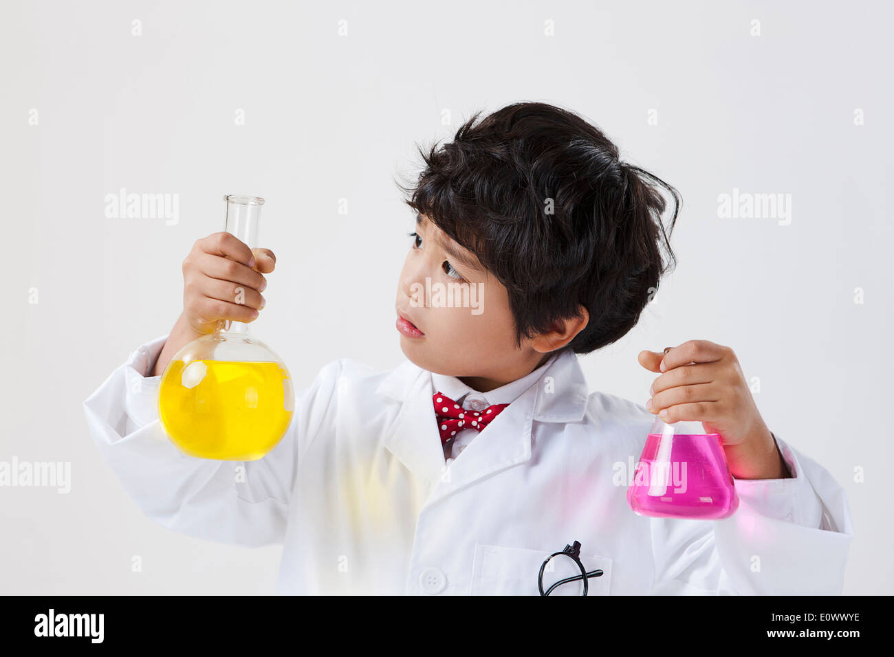 a boy wearing a chemist uniform Stock Photo - Alamy
