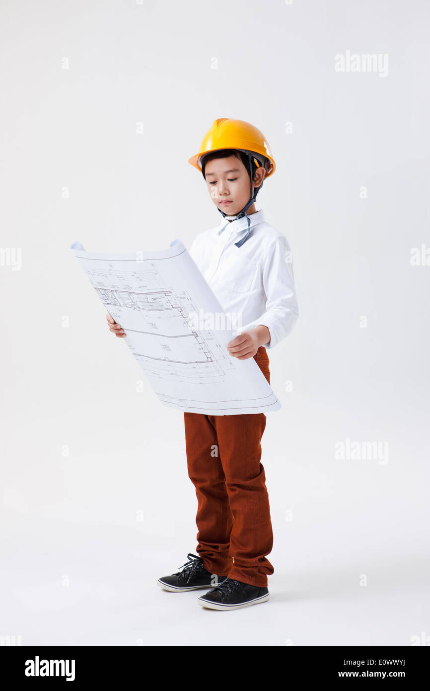 a boy wearing a constructers uniform Stock Photo - Alamy