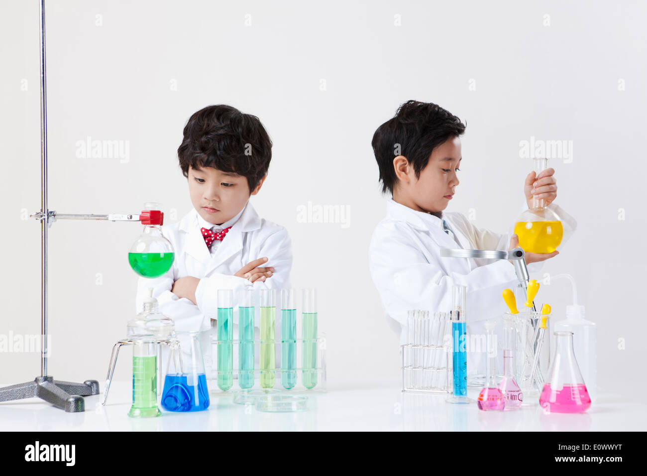 kids wearing chemists uniforms Stock Photo - Alamy