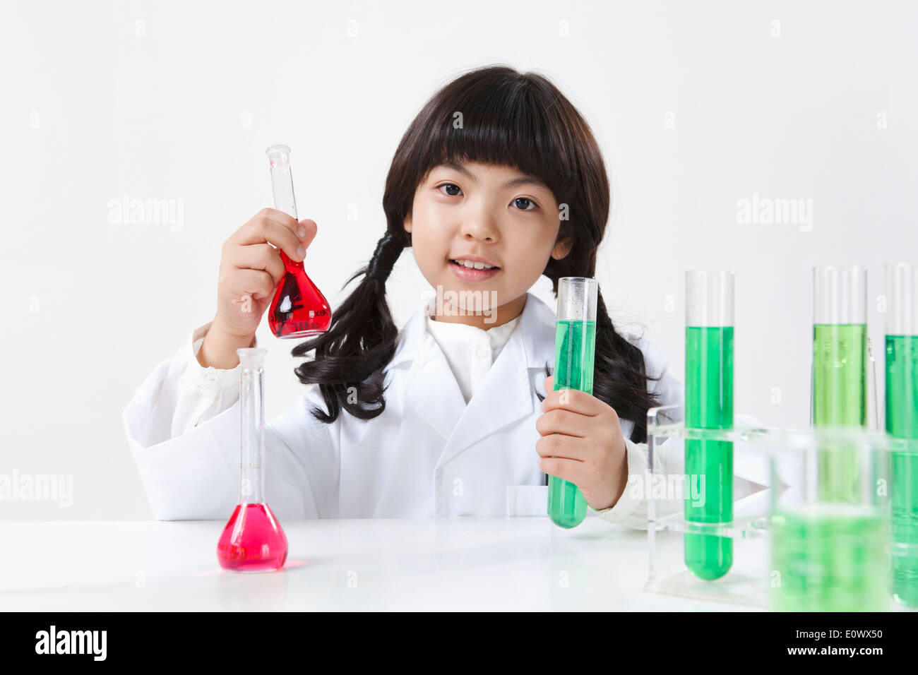 a girl doing chemistry Stock Photo - Alamy