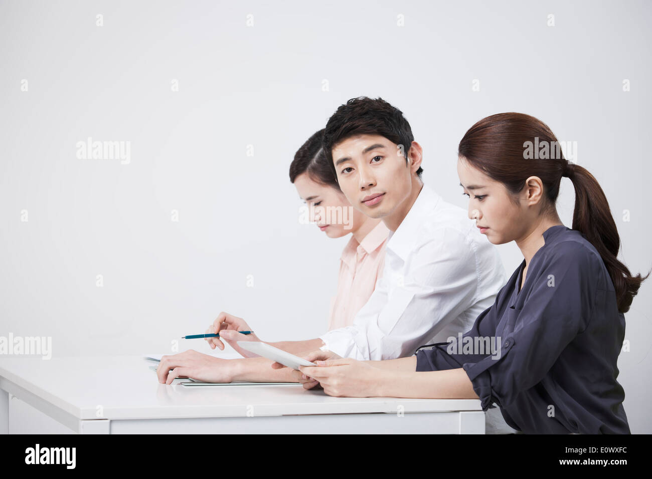 Head and shoulders of man reading papers hi-res stock photography and ...
