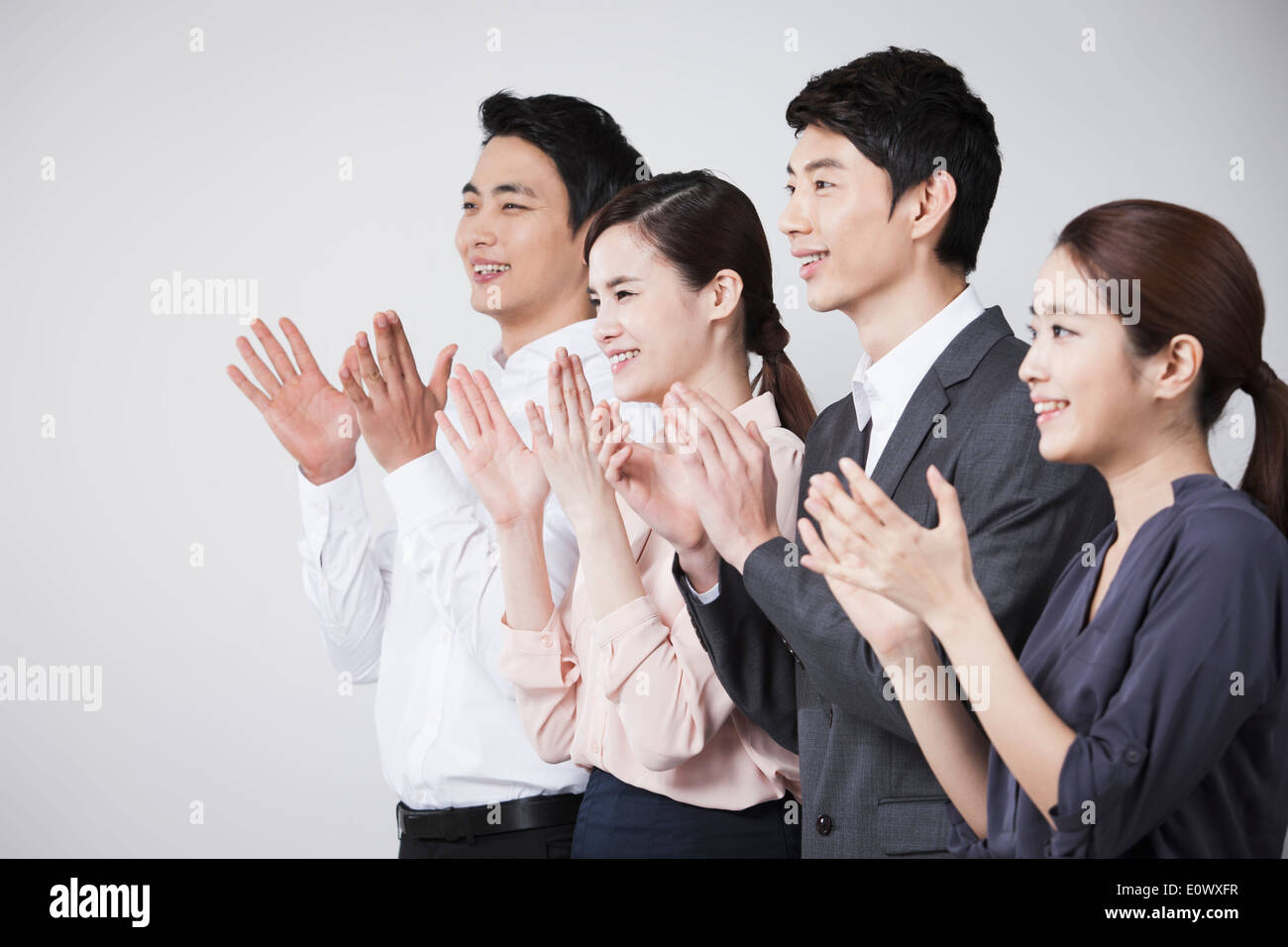 business people clapping their hands Stock Photo - Alamy