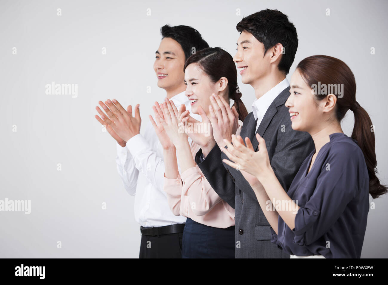Man clapping hands in studio hi-res stock photography and images - Alamy