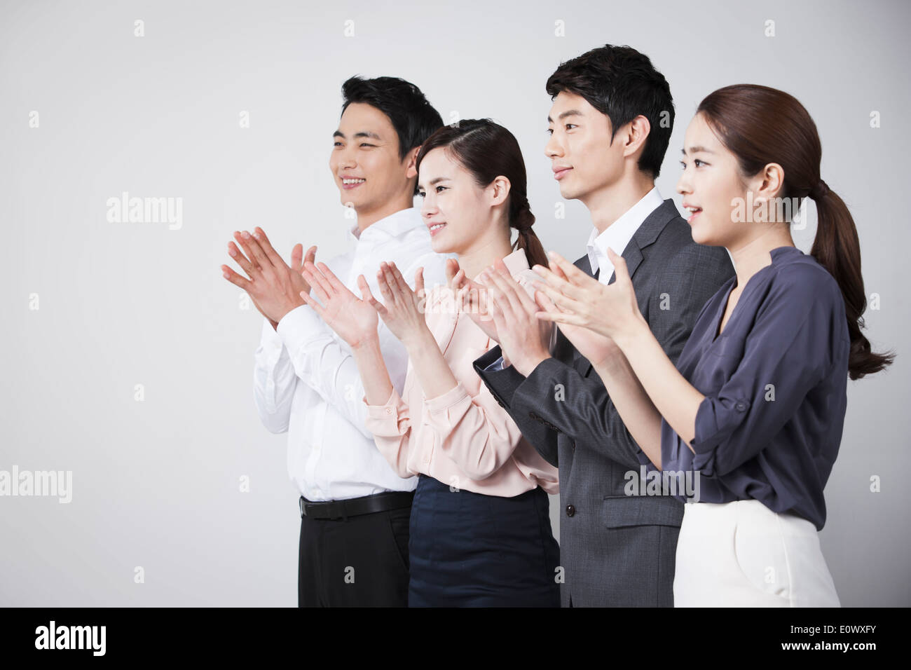 business people clapping their hands Stock Photo - Alamy