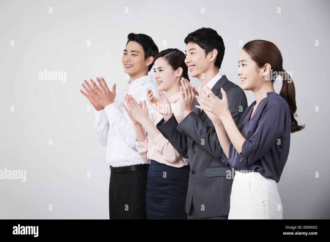 business people clapping their hands Stock Photo - Alamy