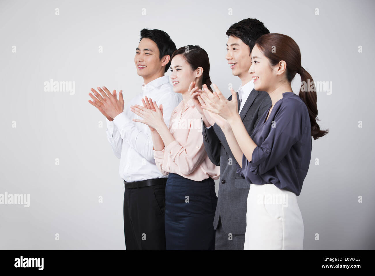 business people clapping their hands Stock Photo - Alamy