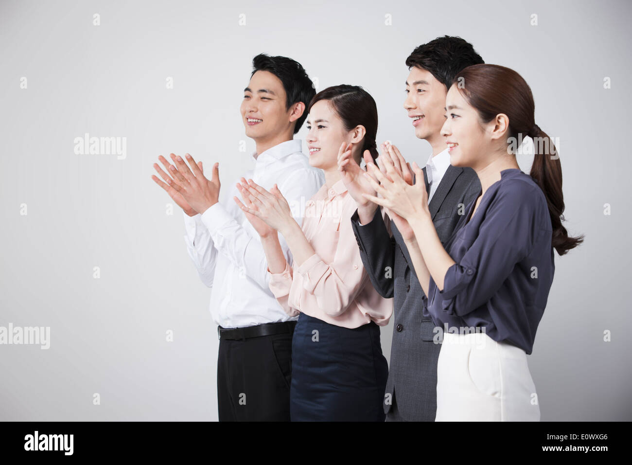 business people clapping their hands Stock Photo - Alamy