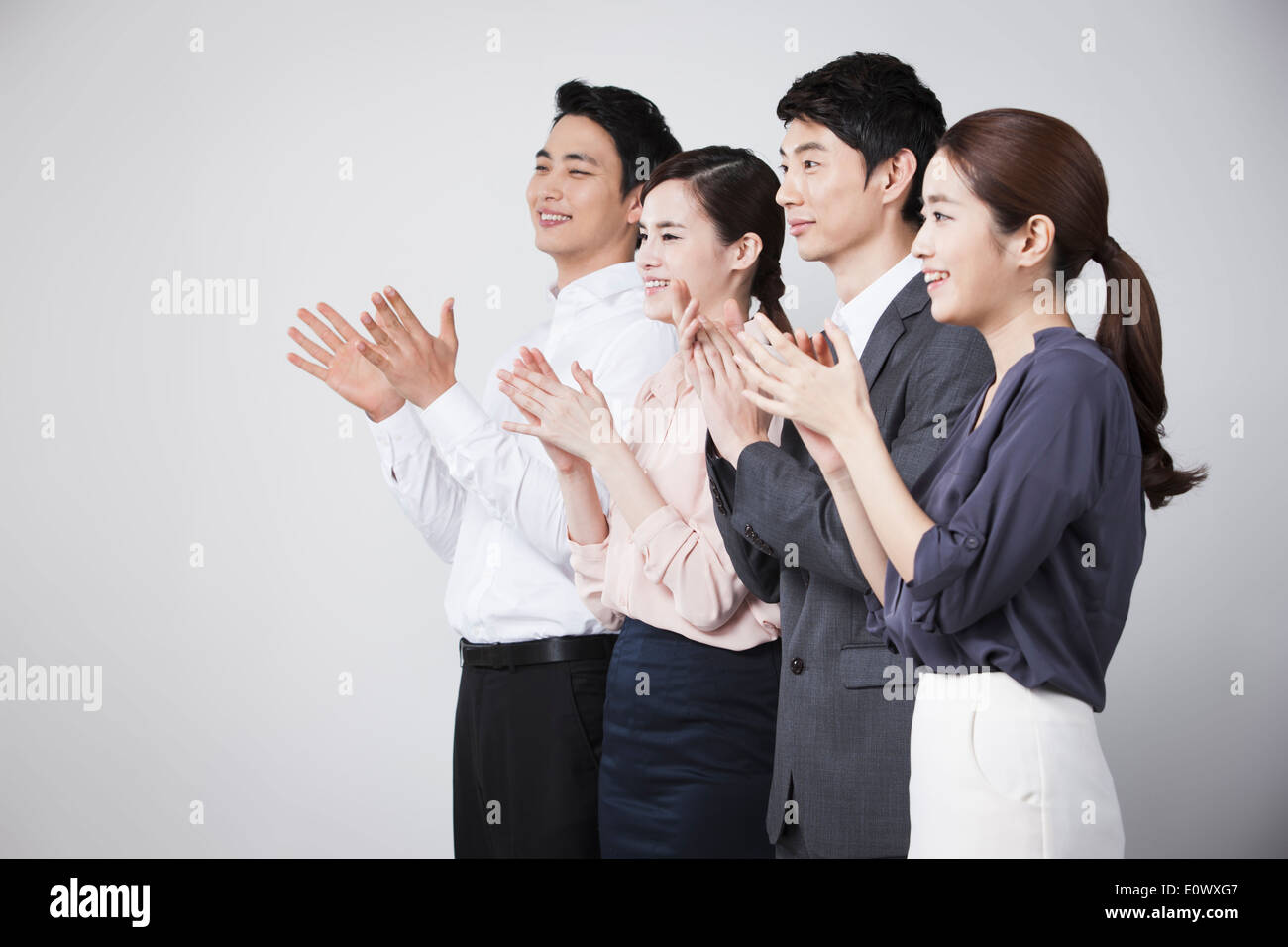 business people clapping their hands Stock Photo - Alamy