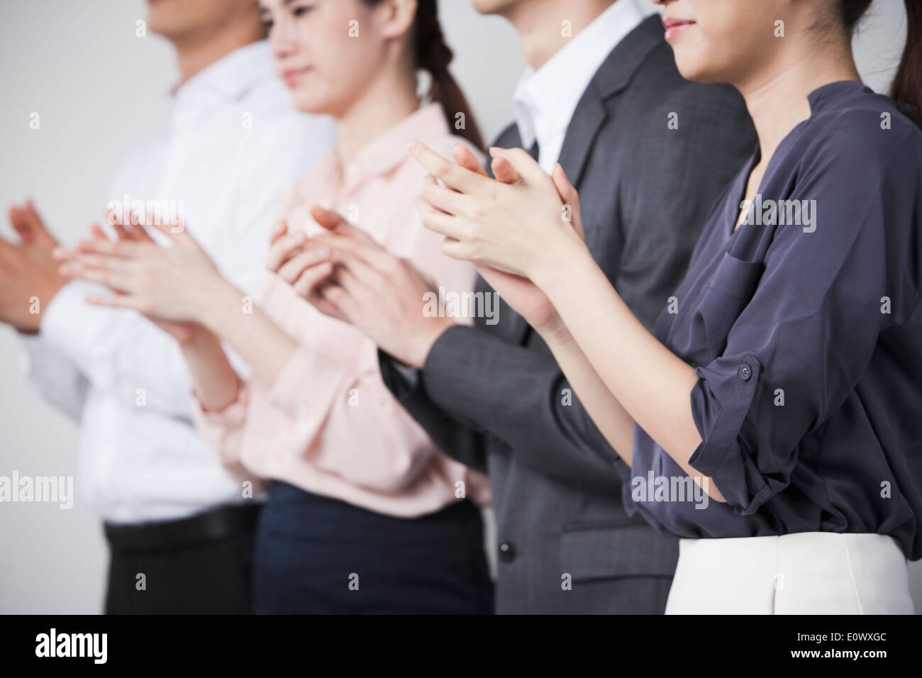 business people clapping their hands Stock Photo - Alamy