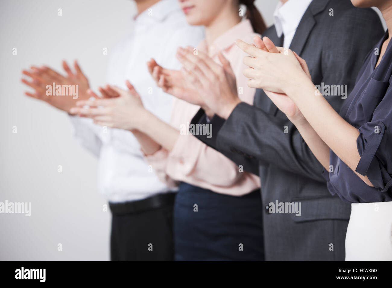 business people clapping their hands Stock Photo - Alamy