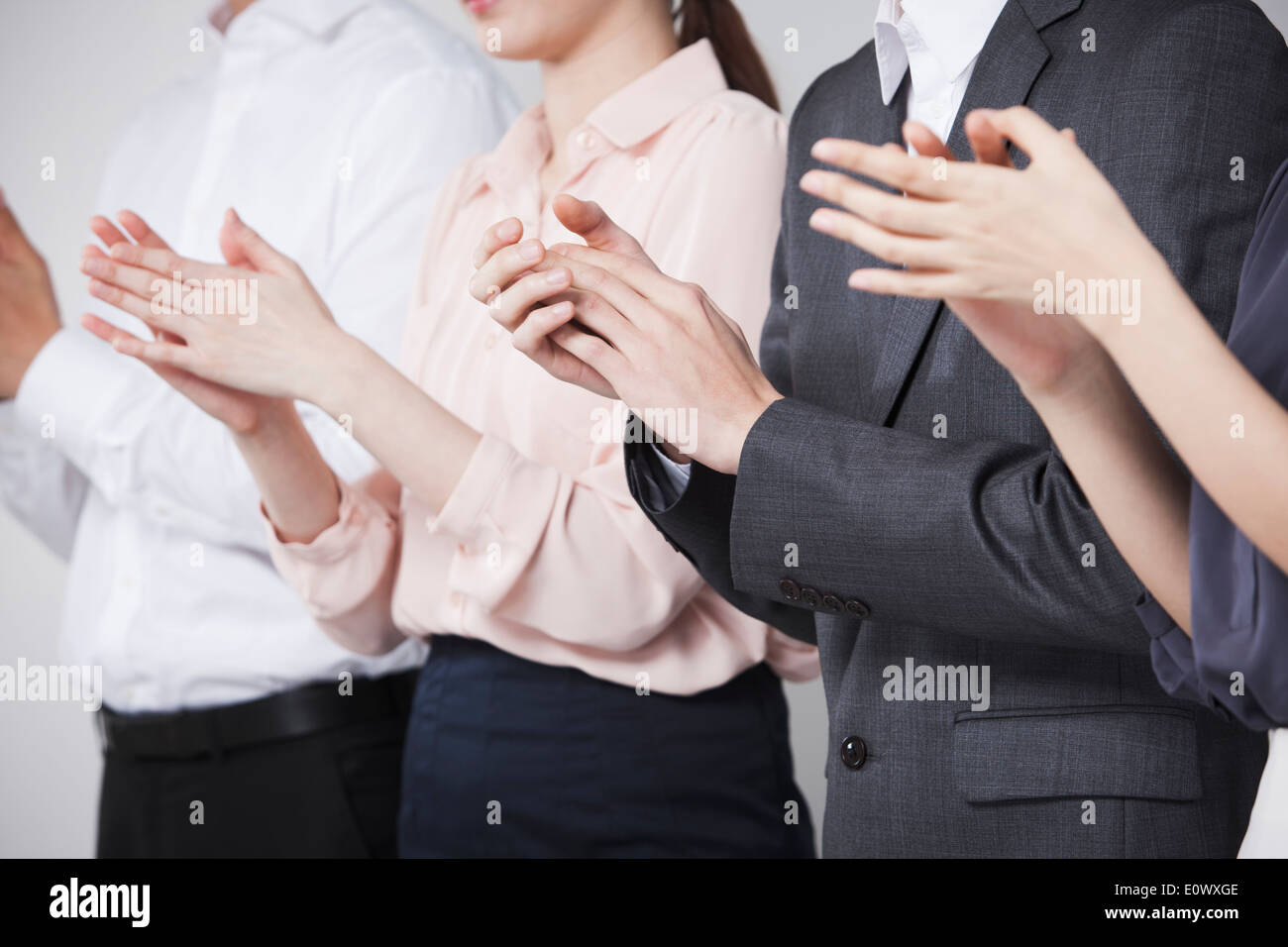 business people clapping their hands Stock Photo - Alamy