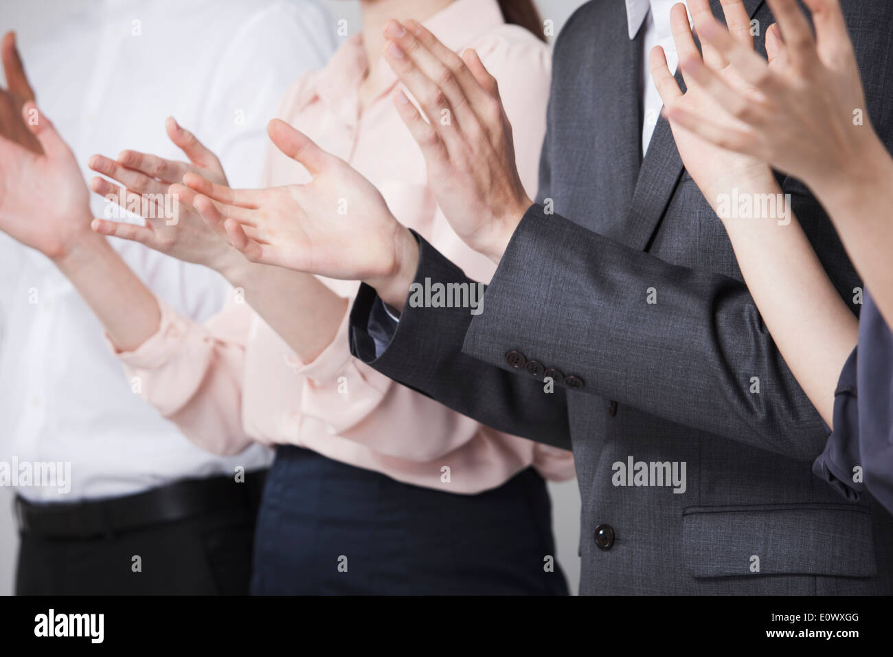 business people clapping their hands Stock Photo - Alamy