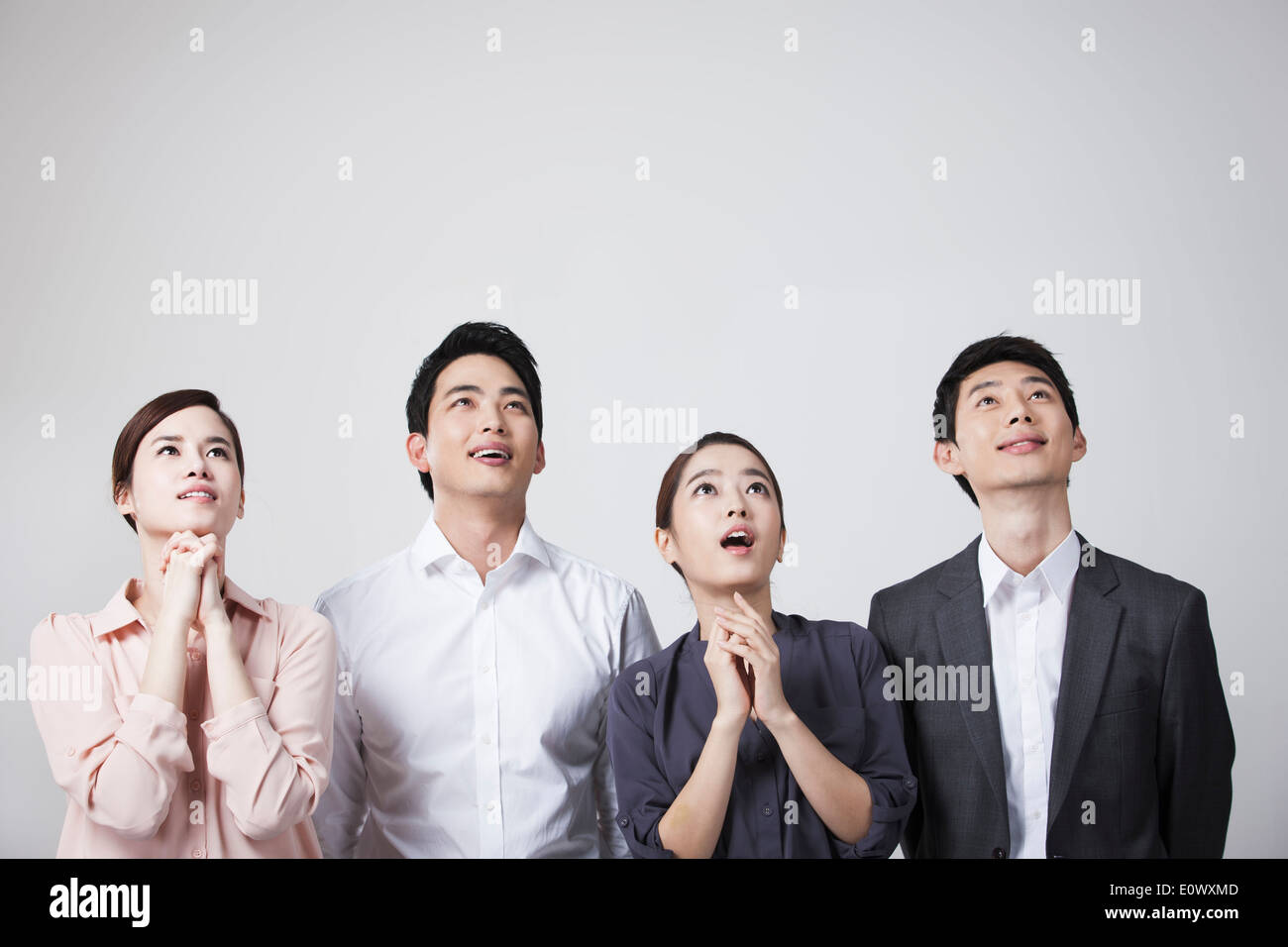 business people looking upwards Stock Photo - Alamy